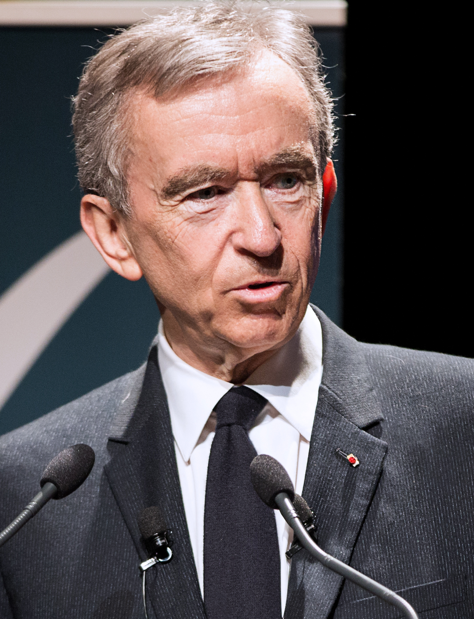 French luxury mogul Arnault defiant at ex-spy chief trial