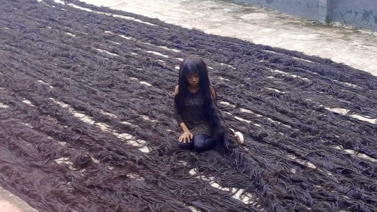 Nigerian Wigmaker Awarded Guinness World Record with Longest Handmade Wig