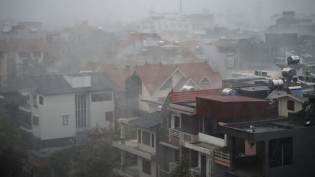 China prepares for heavy rain as typhoon nears Shanghai