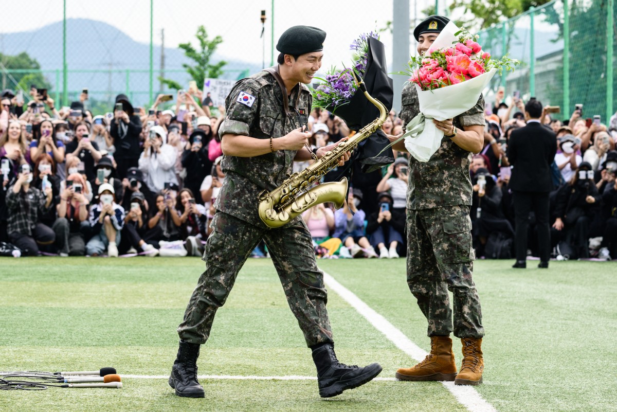 Two BTS megastars released from South Korea military