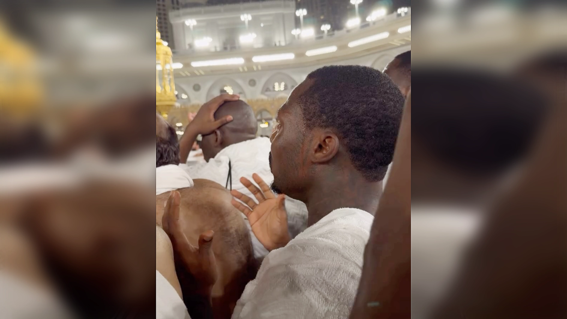 VIDEO: Asake struggles to reach Black Stone in Mecca